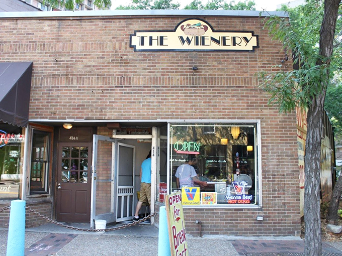 Bun appetit! The Wienery's no-frills exterior hides a world of wiener wonders. Time to relish in some doggone good eats!