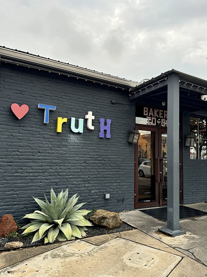 Truth's butcher paper menu: A smoky scroll of deliciousness. It's like a treasure map, but X marks the brisket!