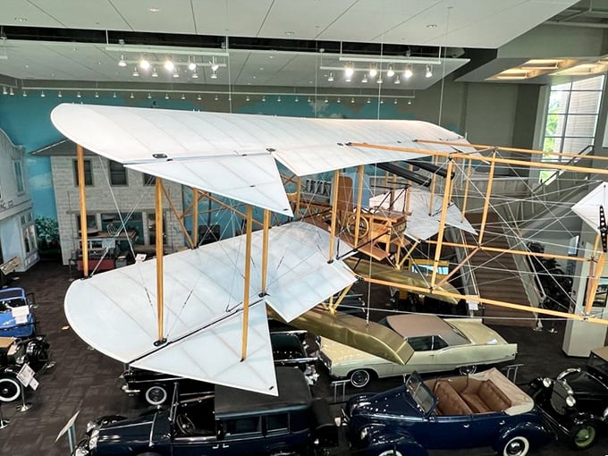 Look up! This vintage plane seems ready for takeoff. Wright brothers, eat your heart out!