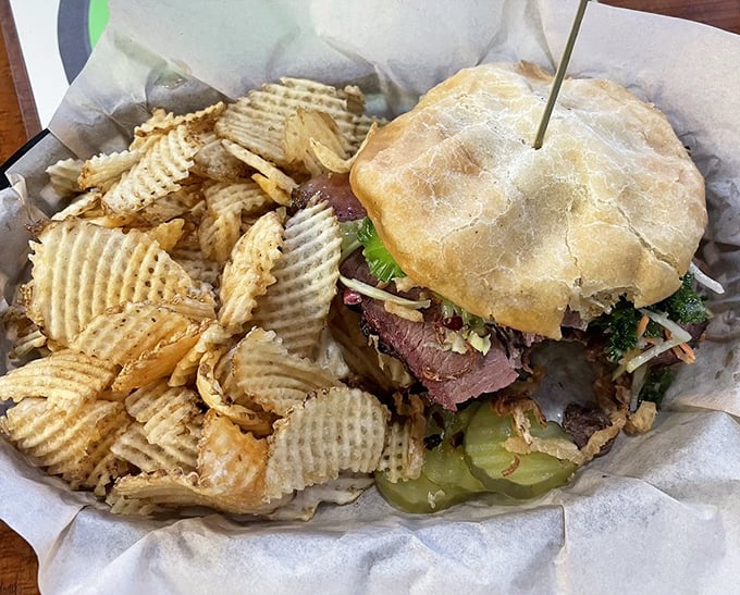 Brisket Burger: Where BBQ meets burger in a flavor explosion that'll make your taste buds do the cha-cha. Those chips? They're joining the party!