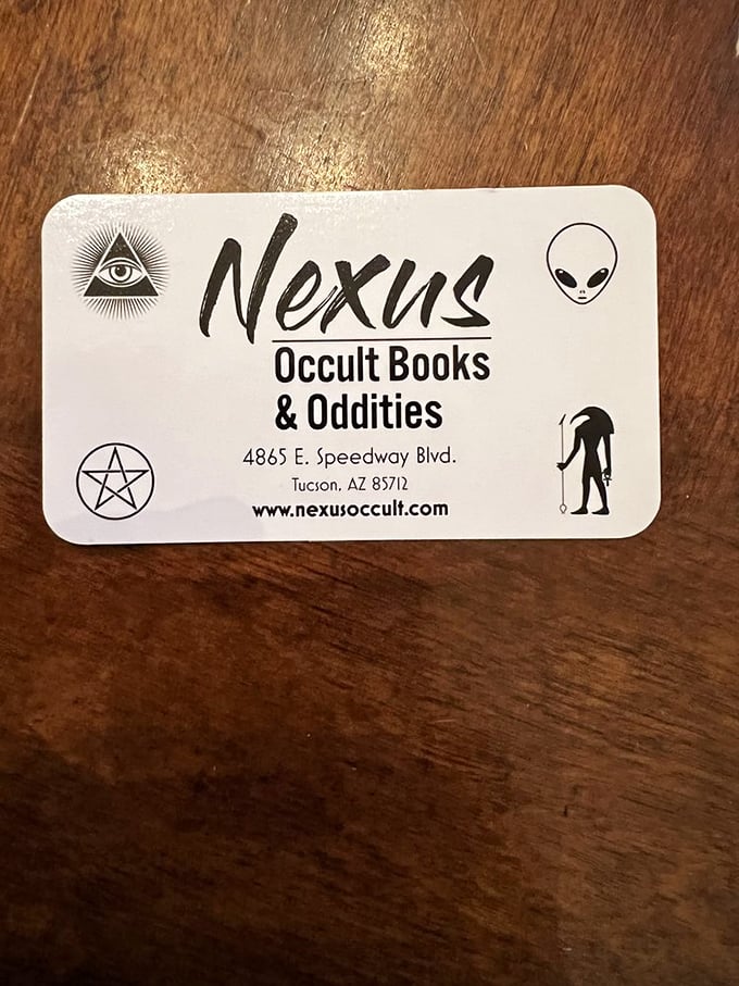 The business card that launched a thousand quests. Nexus's contact info comes with a side of cosmic intrigue.