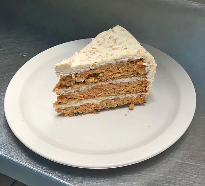 A slice of carrot cake that could make Bugs Bunny switch careers. Layers of spiced perfection topped with creamy frosting.