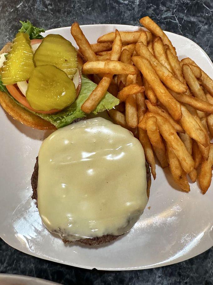 The classic cheeseburger gets a golden sidekick. These crispy fries are the Tonto to your burger's Lone Ranger &ndash; a perfect partnership.