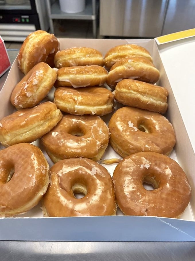 A dozen reasons to smile! This box of glazed donuts is like a support group for your sweet tooth – comforting, understanding, and always there for you.