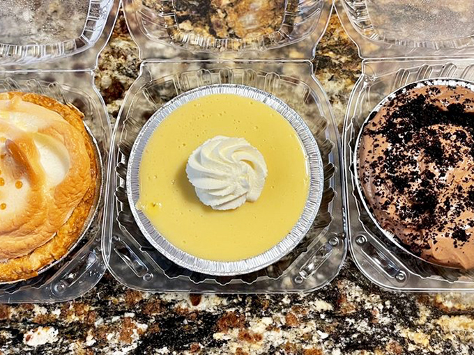 Triple threat alert! Lemon meringue, key lime, and chocolate pies staging a delicious standoff. There are no losers here.