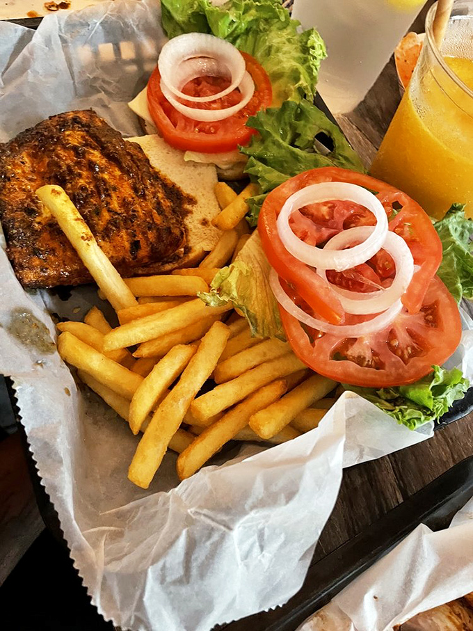 The Mahi sandwich - where fish meets fun! It's like a beach vacation between two buns, complete with a crispy, golden tan.