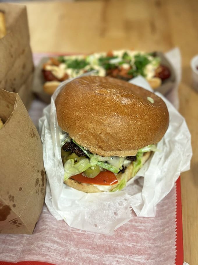 The Olive Burger: Where Mediterranean dreams meet Midwest comfort. It's like a vacation between two buns!