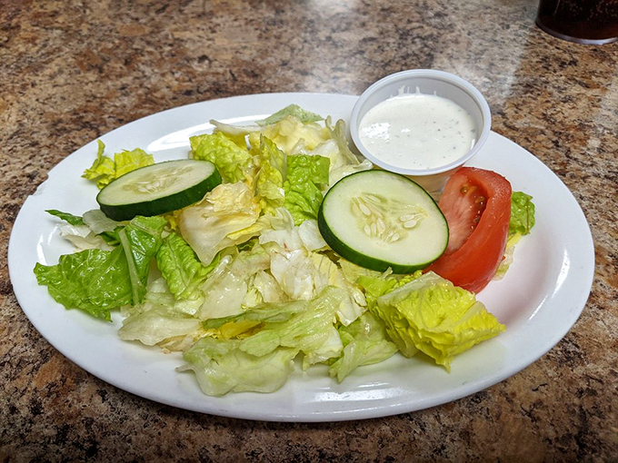 Even the salad looks excited to be here! Fresh, crisp, and ready to play sidekick to your seafood superhero.