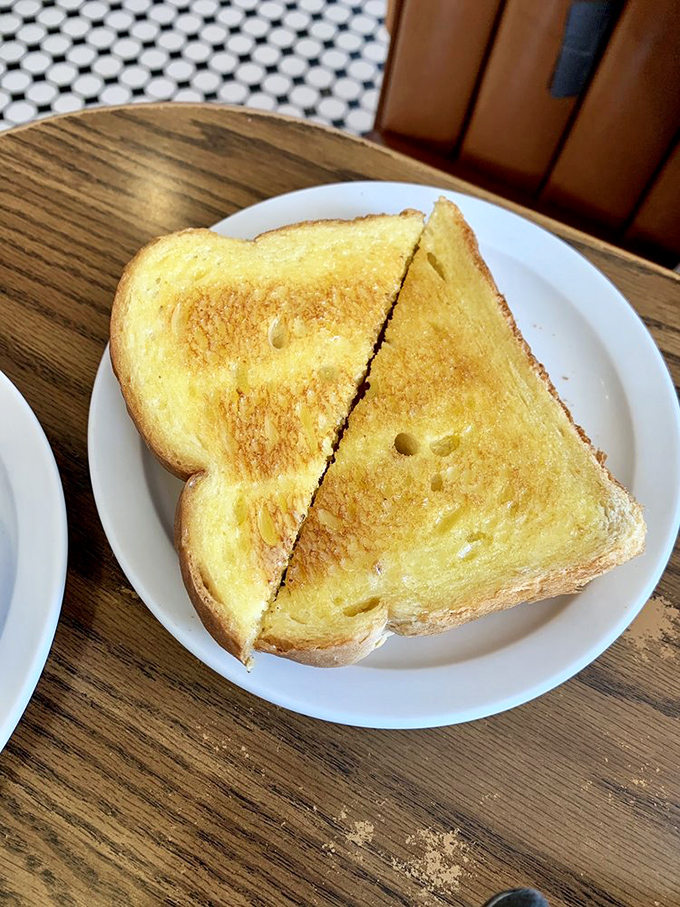 Golden-brown perfection! This sourdough toast is crunchier than your dad's favorite vinyl records and twice as satisfying.