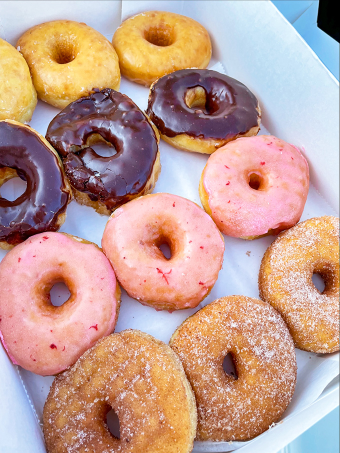 Pretty in pink! These strawberry-glazed delights are the Elle Woods of the donut world - sweet, sassy, and impossible to resist.