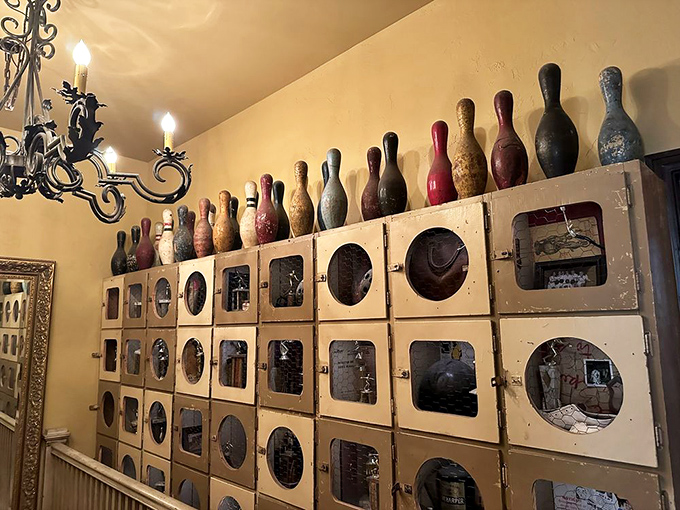 Trophy case or liquid gold mine? Either way, this display is giving us serious "Indiana Jones meets mixologist" vibes.