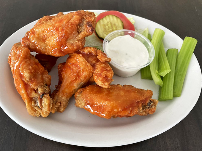 Buffalo wings so good, they'll make you forget about your team's losing streak. Finger-lickin' therapy at its finest!