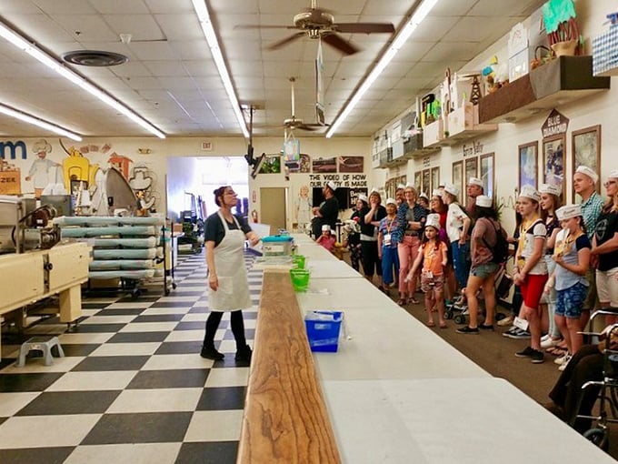 All aboard the chocolate express! This tour guide's enthusiasm is as infectious as the aroma of cocoa wafting through the air.