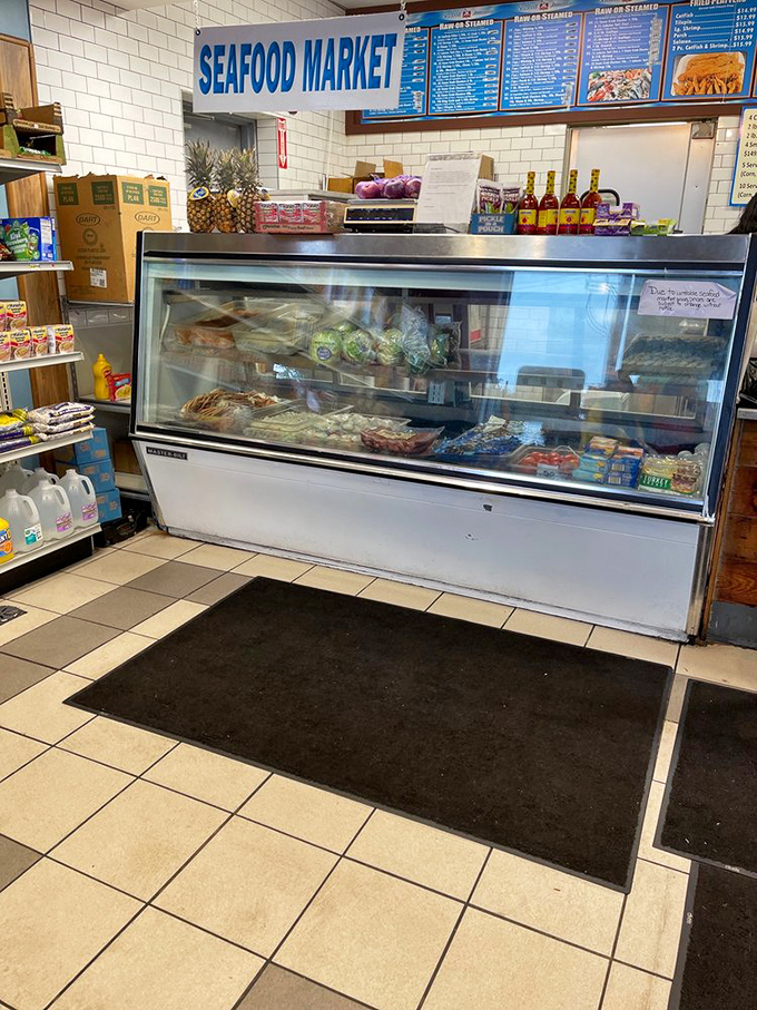 The seafood counter: where dreams of oceanic feasts come true. It's like a aquarium, but tastier!