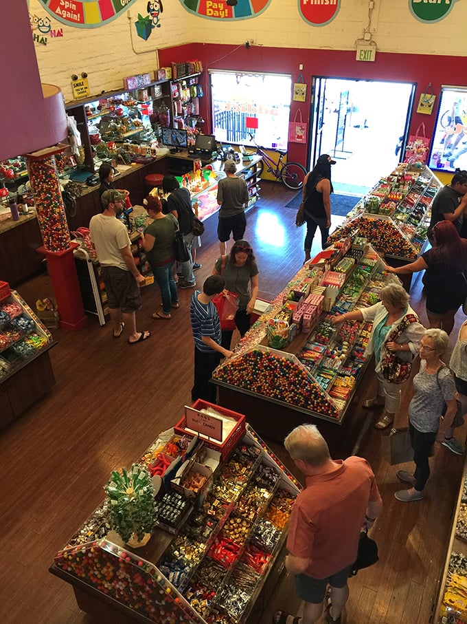 Candy shoppers in their natural habitat: wide-eyed, slightly overwhelmed, and contemplating how many pounds of sugar they can reasonably carry home.