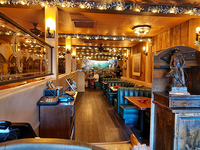 Antlers and artwork and warm wood, oh my! This dining area is cozier than a bear hug from Smokey himself.
