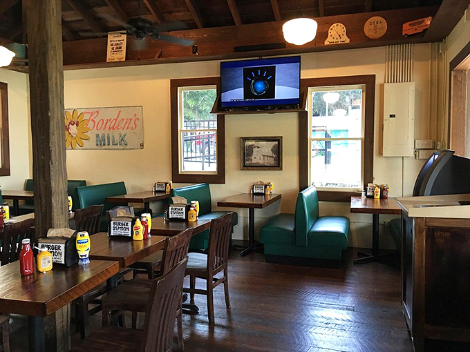 Retro vibes and comfort food collide in this cozy dining area. It's like your grandma's kitchen got a cool makeover.