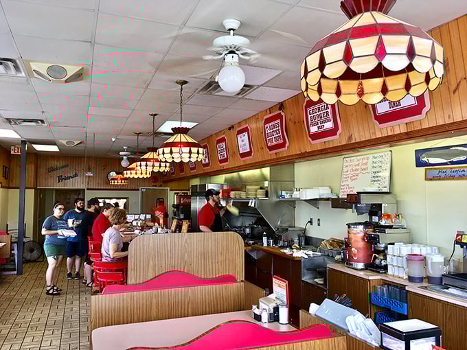 Diner nirvana achieved! With its cozy booths and warm lighting, this dining area is where breakfast dreams come true.