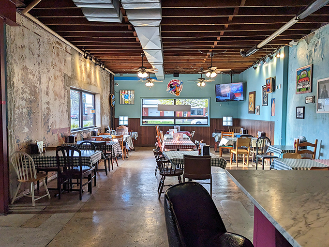 Welcome to the chicken chapel! Where mismatched chairs and checkered tablecloths set the stage for a religious experience in fried poultry.