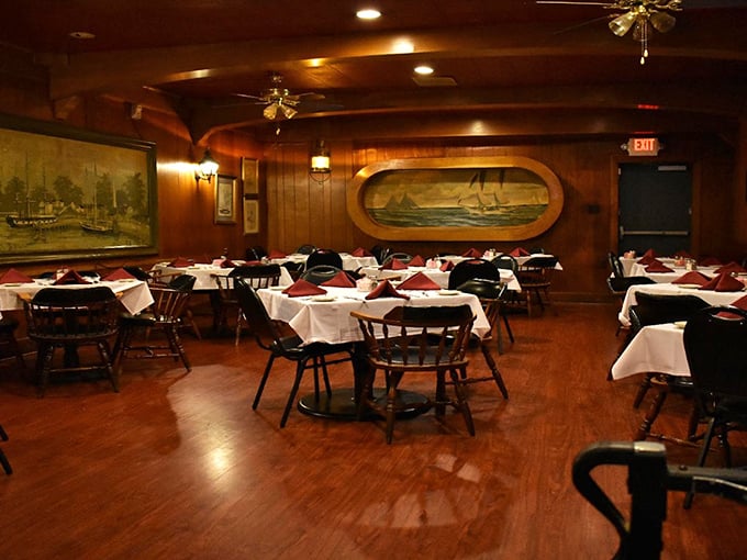 Nautical nostalgia meets culinary comfort. This dining area feels like the cozy cabin of a luxury liner, minus the seasickness.