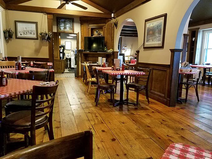 Step into Doe's dining area, where checkered tablecloths and wooden beams create an atmosphere cozier than your grandma's living room.