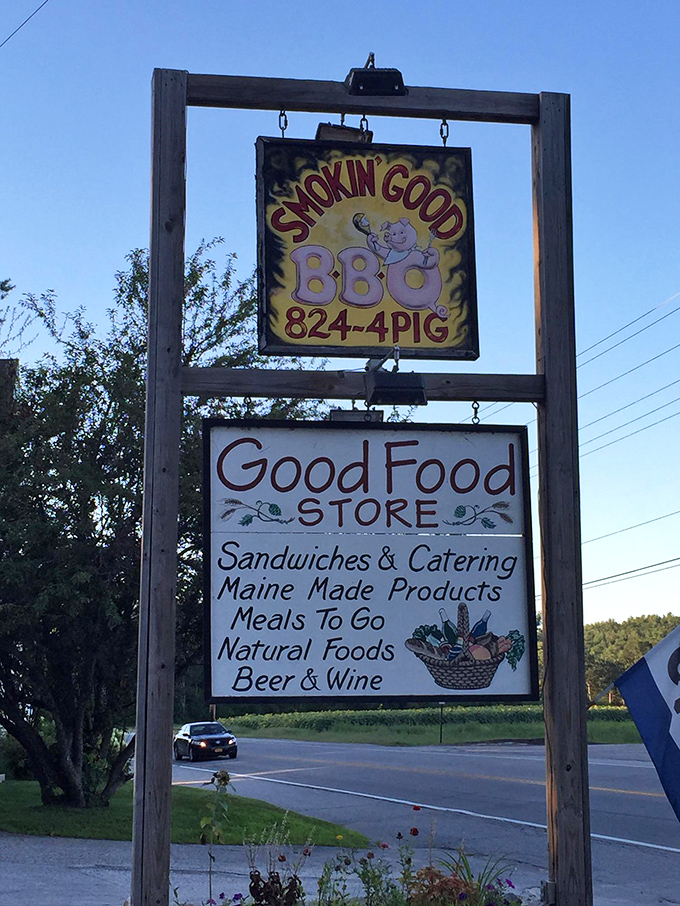 Follow your nose! This sign is like a lighthouse for hungry travelers, guiding them to smoky salvation.