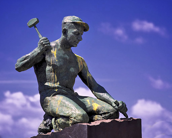 This stonecutter statue is Stonington's version of Rocky Balboa. He's been chiseling away at the town's history for years, and boy, does he have stories to tell.