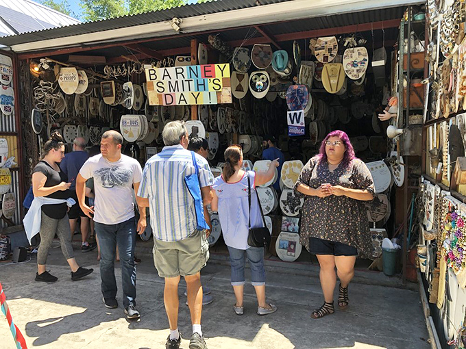 Crowds gather for a different kind of 'seat sale.' Barney's Day looks like Black Friday for bathroom art enthusiasts!