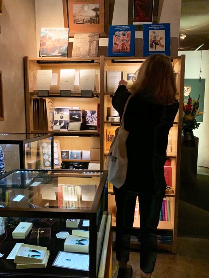 "Browsing or pondering the mysteries of the universe?" This visitor seems caught between fascination and bewilderment &ndash; a common state here.