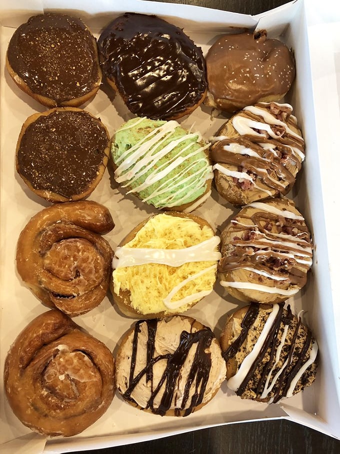 Doughnut dilemma! This box of assorted treats is a flavor roulette. Will you share, or keep this treasure trove all to yourself?
