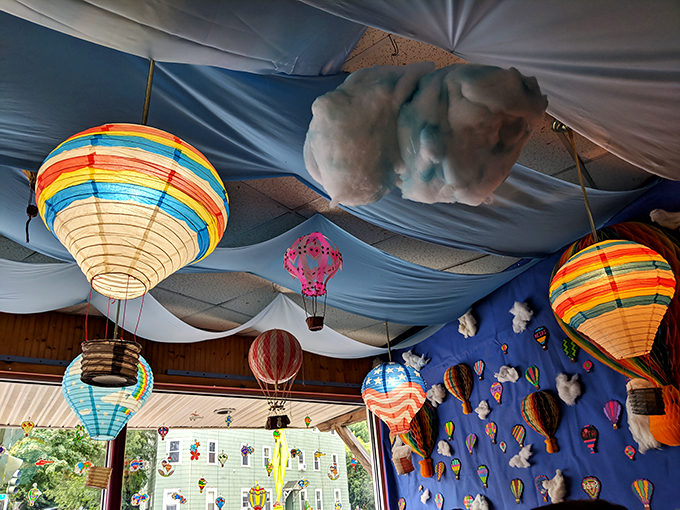 Up, up, and away! Rolly's whimsical ceiling decor proves that sometimes, the best views at a diner are straight above your plate. Talk about elevated dining!
