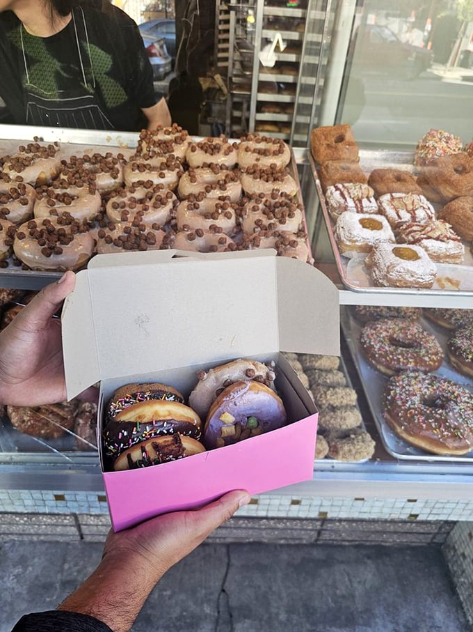 Decision paralysis never tasted so good. Bob's colorful array of donuts is like a Willy Wonka fever dream come to life.