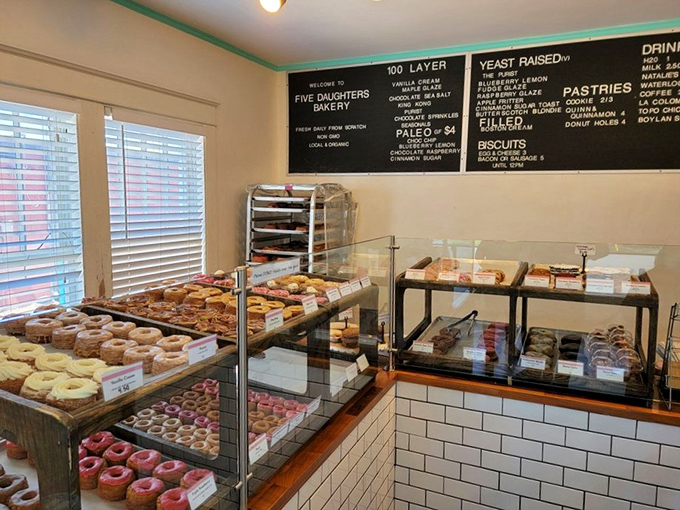Step into a world where calories don't count and happiness is served by the dozen. The pink neon sign is like a beacon of sugary hope.