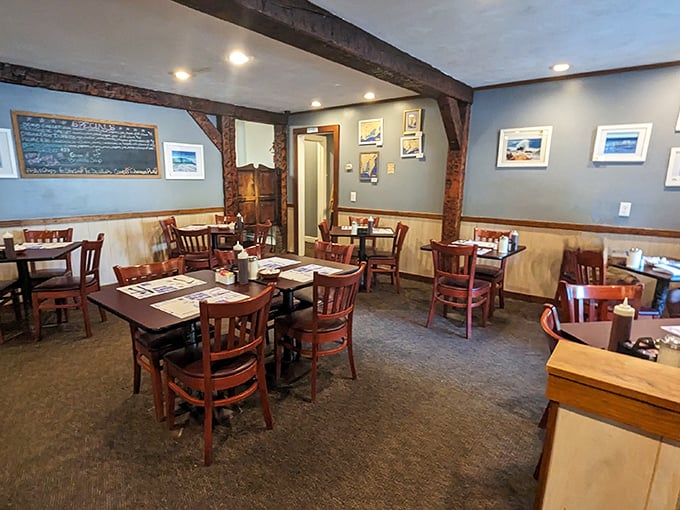 Rustic charm meets modern comfort! This dining room feels like it was decorated by a lumberjack with impeccable taste.
