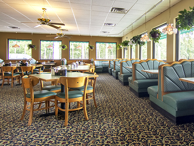 Sunlight streams through windows, illuminating a sea of cozy booths. It's like the diner version of "Cheers," where everybody knows your breakfast order.