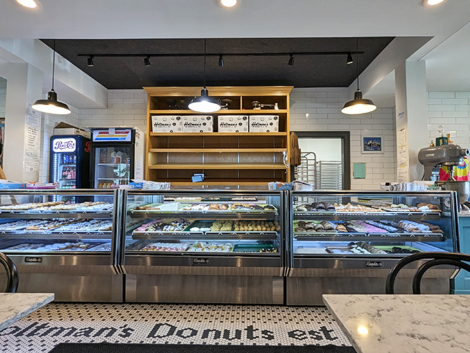 Donut heaven awaits! With display cases stretching as far as the eye can see, Holtman's is the Willy Wonka factory of fried dough.