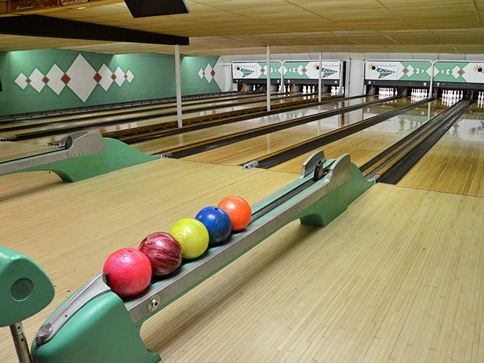 Lanes of glory! These polished pathways to bowling greatness are just waiting for your next strike... or spectacular gutter ball.