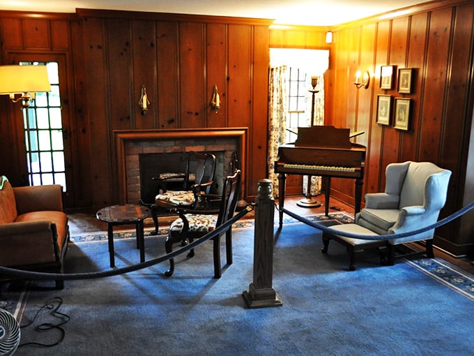 Mad Men meets Downton Abbey in this swanky living room. Don Draper would feel right at home sipping an Old Fashioned by that fireplace.