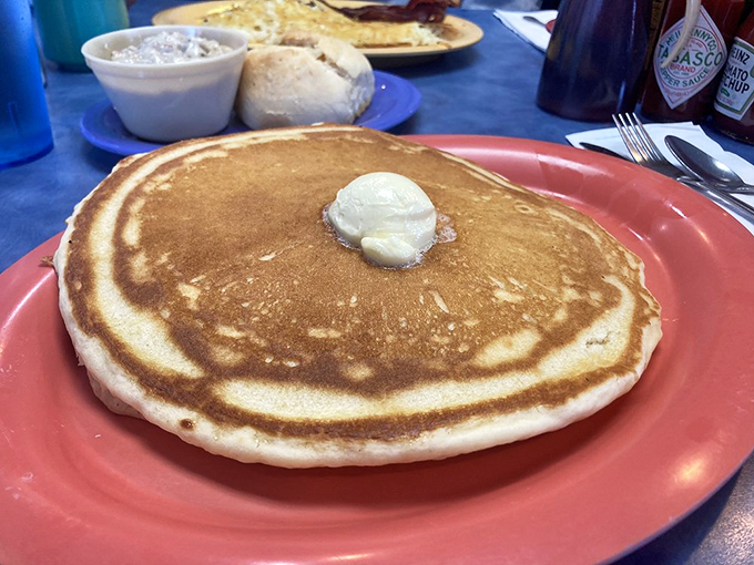 Is it a plate or a flying saucer? This pancake is so big, it might need its own zip code. Houston, we have a delicious problem!