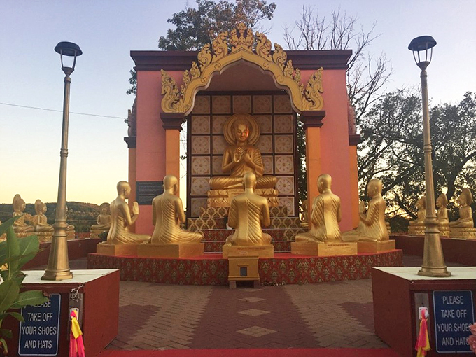 This isn't your average roadside attraction. It's a slice of Southeast Asia, complete with golden guardians.