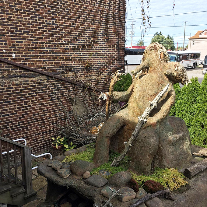 Even trolls need a break sometimes. This stone giant looks like he's contemplating the meaning of life... or maybe just his next meal.