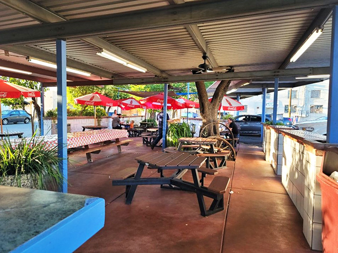 Welcome to the al fresco time machine! These tables have seen more stories than a library and more first dates than a drive-in movie.