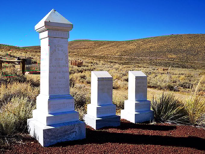 "Eternity with a view." White tombstones stand sentinel in the desert, reminding us that even in death, location is everything.