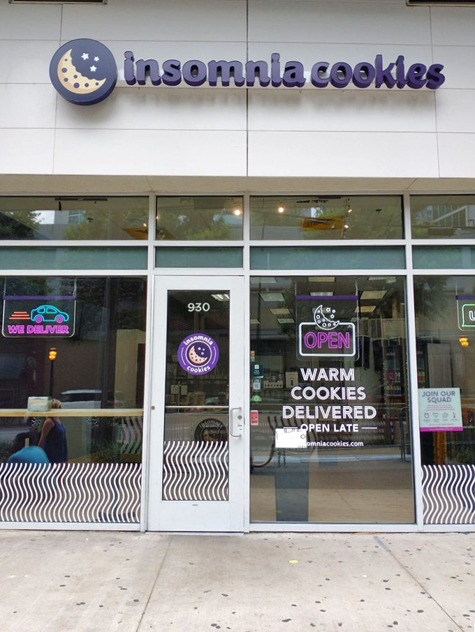 Insomnia Cookies: Where midnight cravings meet their match! This glowing storefront is like a lighthouse for the cookie-starved masses.