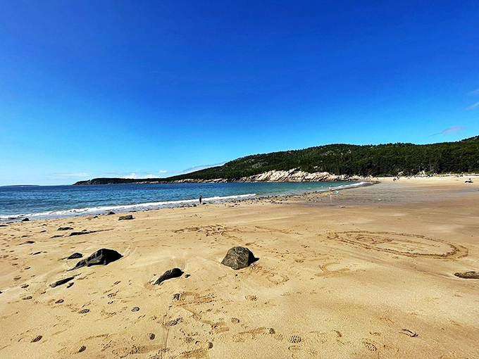 Mountains meet ocean in this postcard-perfect scene. It's like Mother Nature showing off her best work.