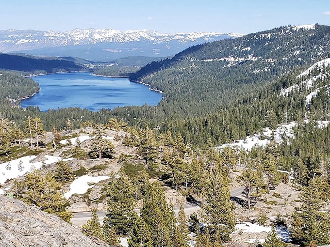 Crystal clear and history-rich: Donner Lake's waters tell tales of pioneers while reflecting stunning mountain vistas.