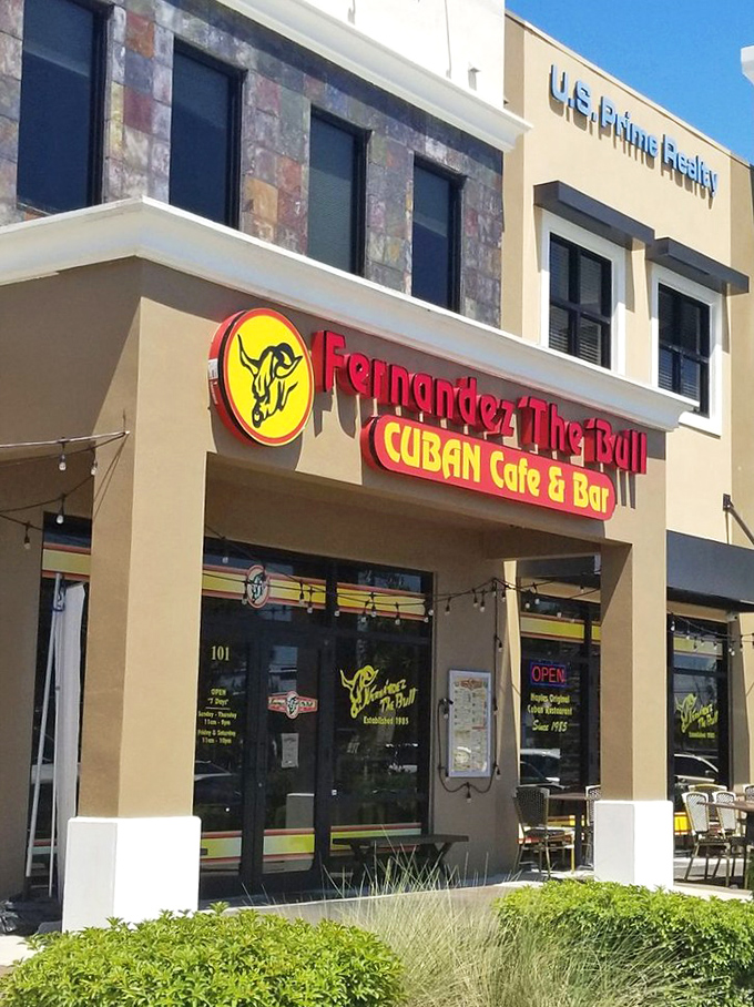 Yellow sign, red awning, Cuban delights waiting. Fernandez the Bull is where Naples gets its Cuban fix, one ropa vieja at a time.