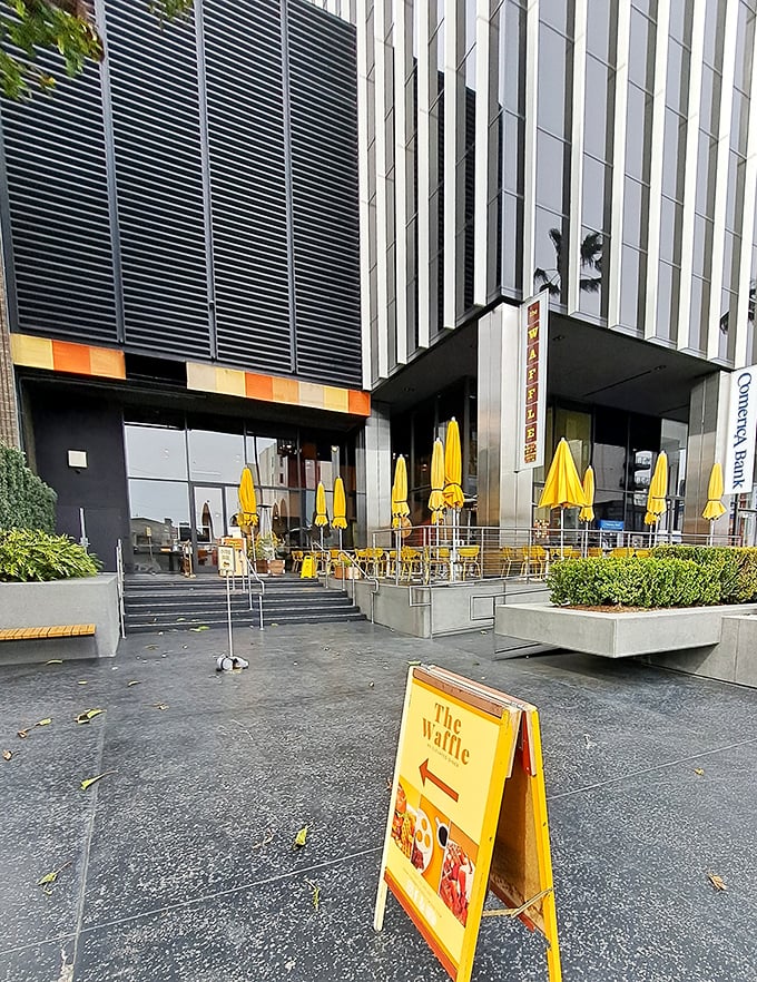 Waffles go wild! The Waffle's sleek exterior and funky yellow chairs promise a morning meal that's anything but square.