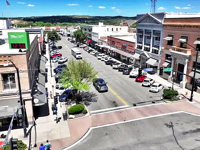 Prescott: A hidden gem that's more precious than your grandmother's secret recipe. This aerial view showcases a town where relaxation isn't just encouraged, it's practically mandatory.
