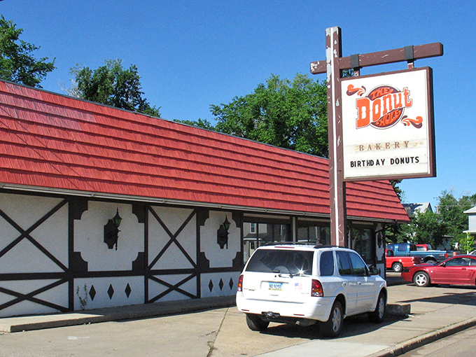 A red-roofed oasis in the heart of Dickinson, The Donut Hole beckons with promises of sugary bliss. It's like finding Willy Wonka's factory, but with more sprinkles and less singing.